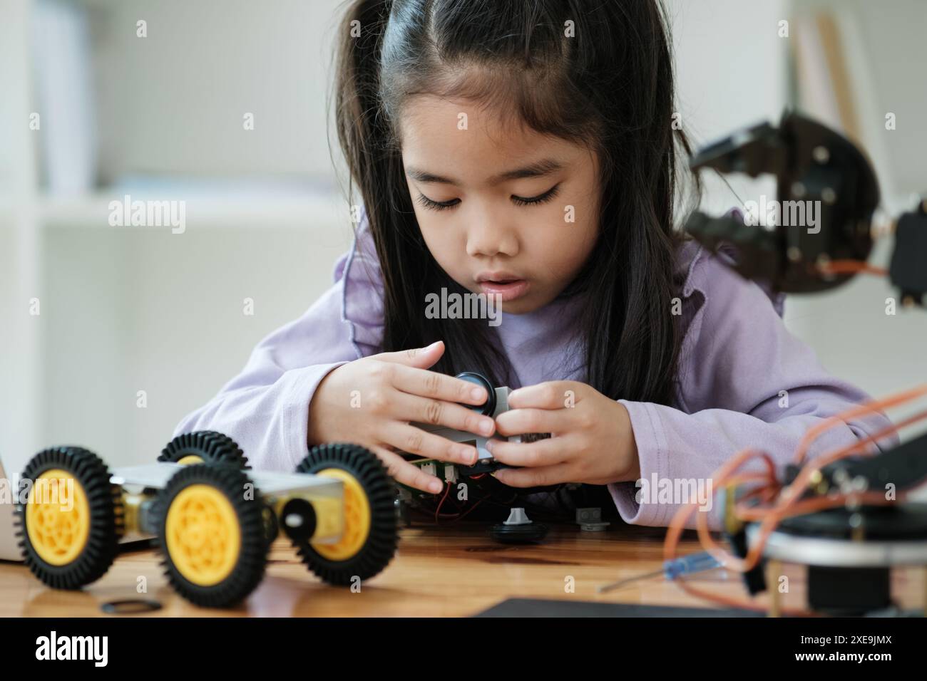 STEM education concept. Asian young girl learning robot design Stock ...