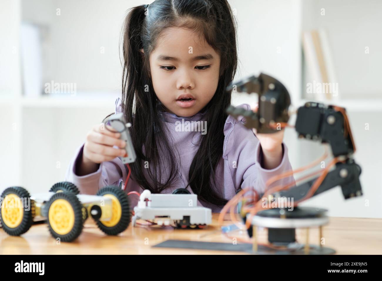 STEM education concept. Asian young girl learning robot design Stock ...