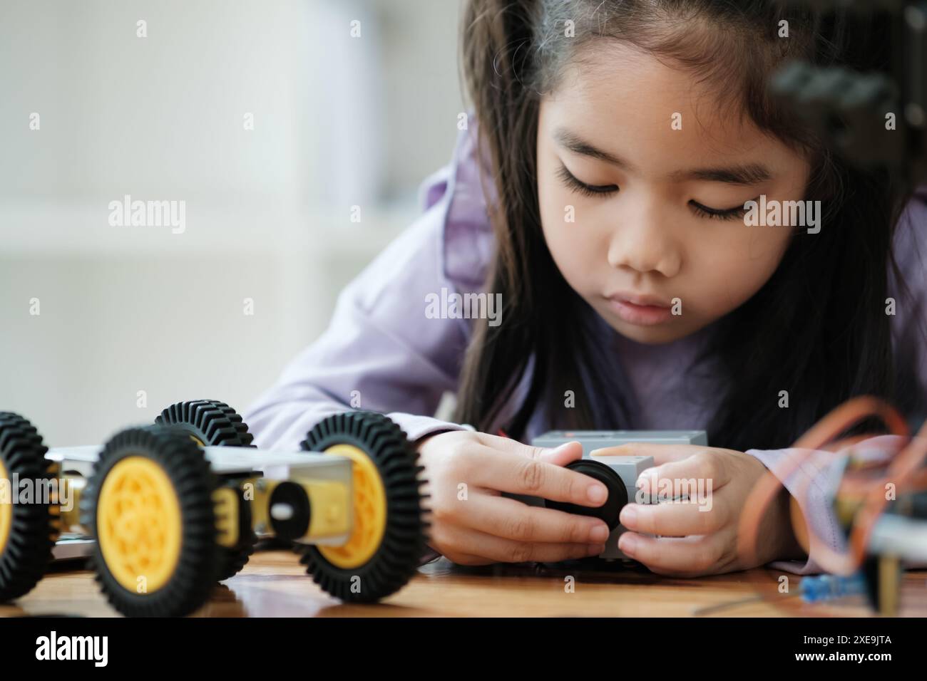 STEM education concept. Asian young girl learning robot design Stock ...