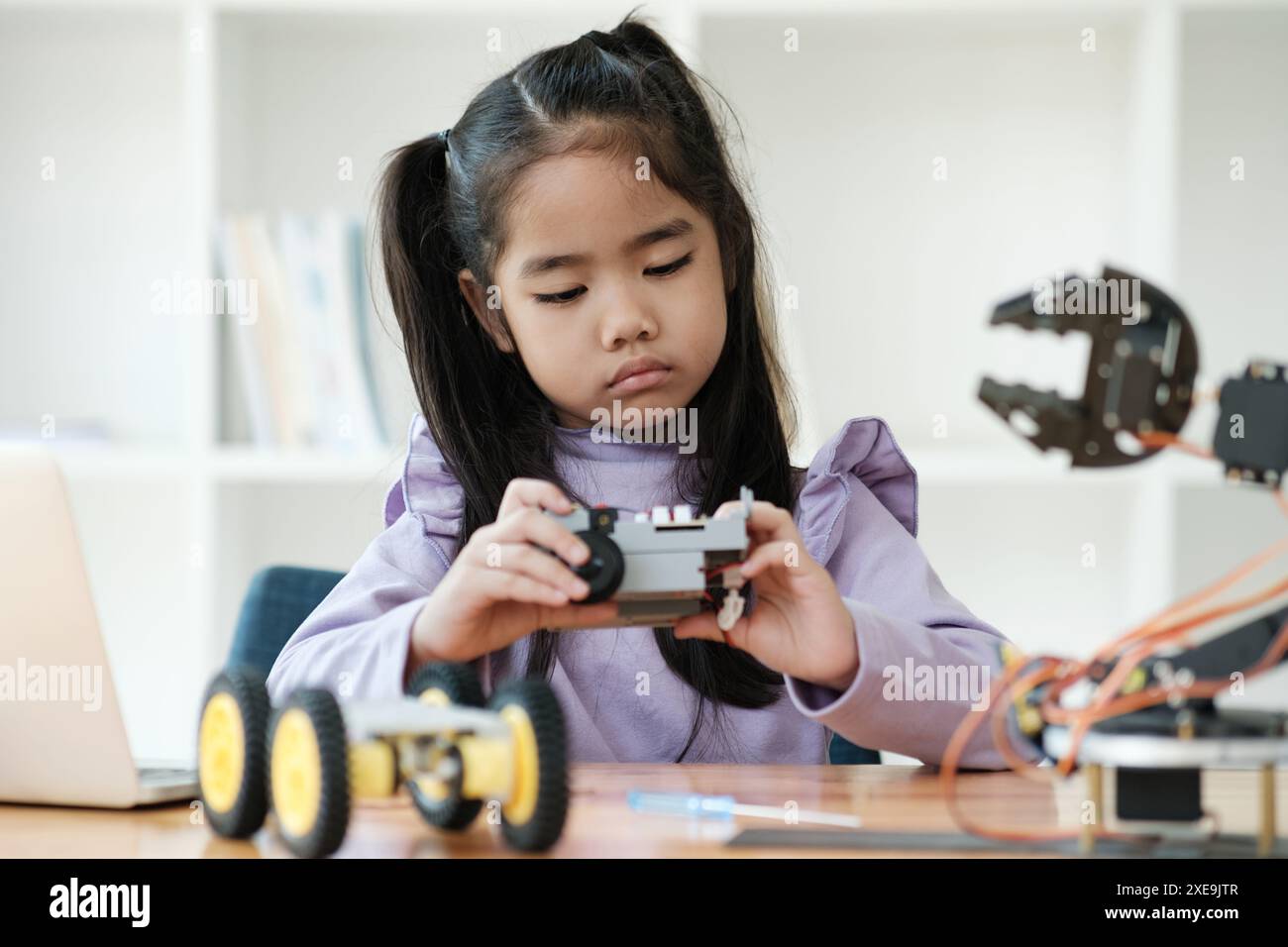 STEM education concept. Asian young girl learning robot design Stock ...