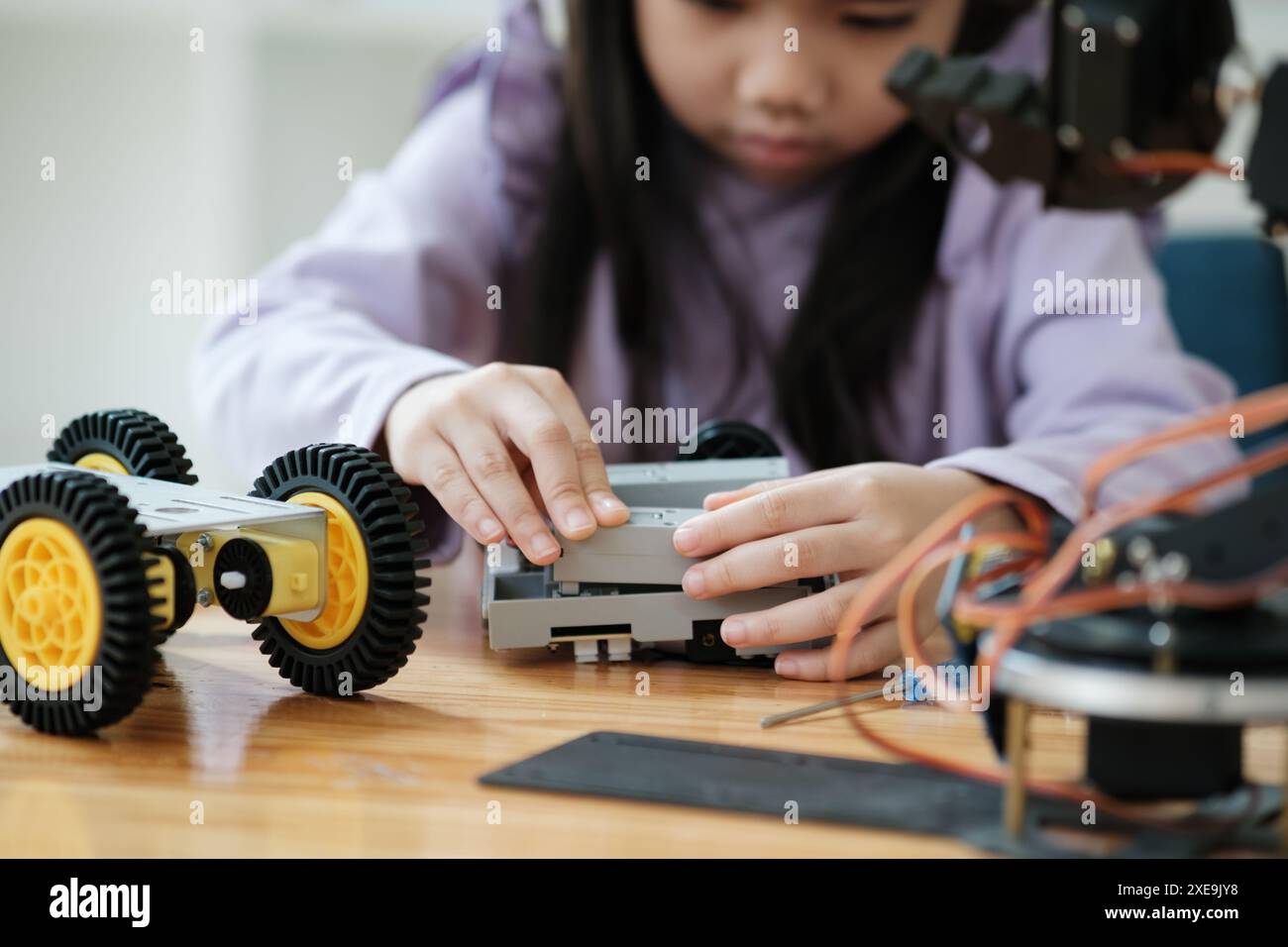 STEM education concept. Asian young girl learning robot design Stock ...