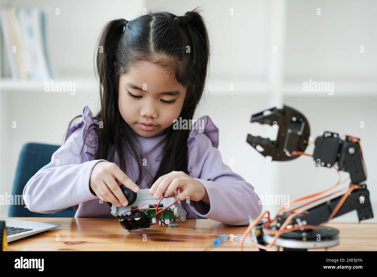 STEM education concept. Asian young girl learning robot design Stock ...