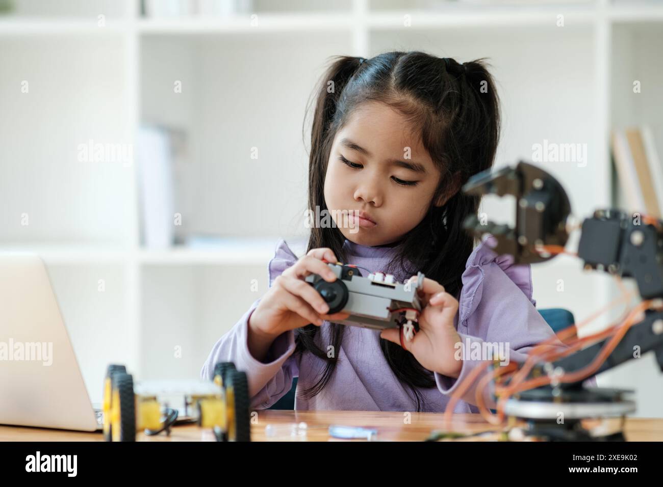 STEM education concept. Asian young girl learning robot design Stock ...