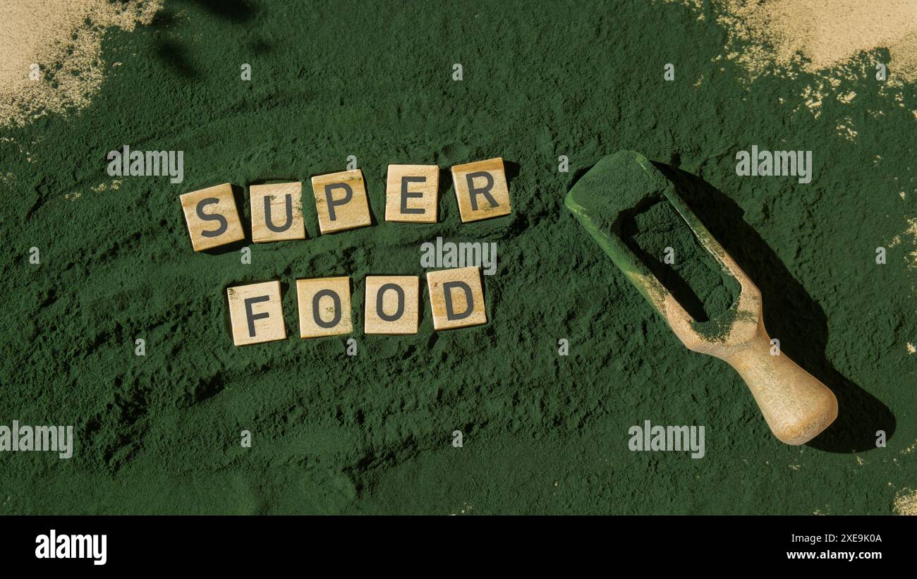 SUPERFOOD letter chlorella on green background of algae superfood ...
