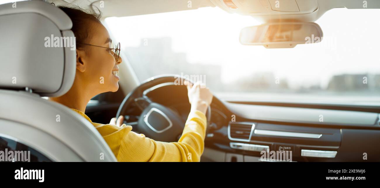 Smiling Woman Driving Car During Daytime, Panorama Stock Photo - Alamy