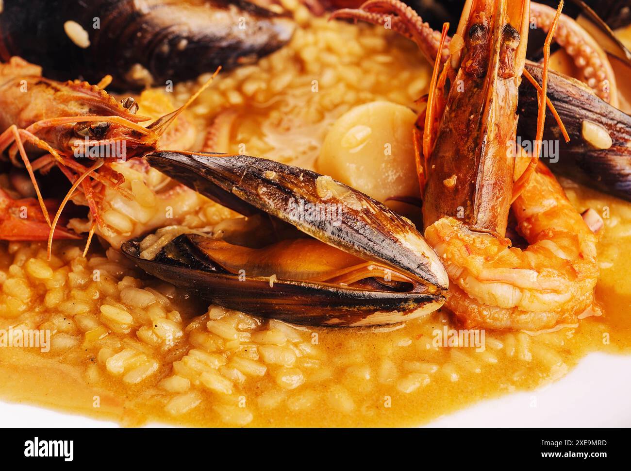 Seafood risotto with mussel shrimp and squid Stock Photo - Alamy