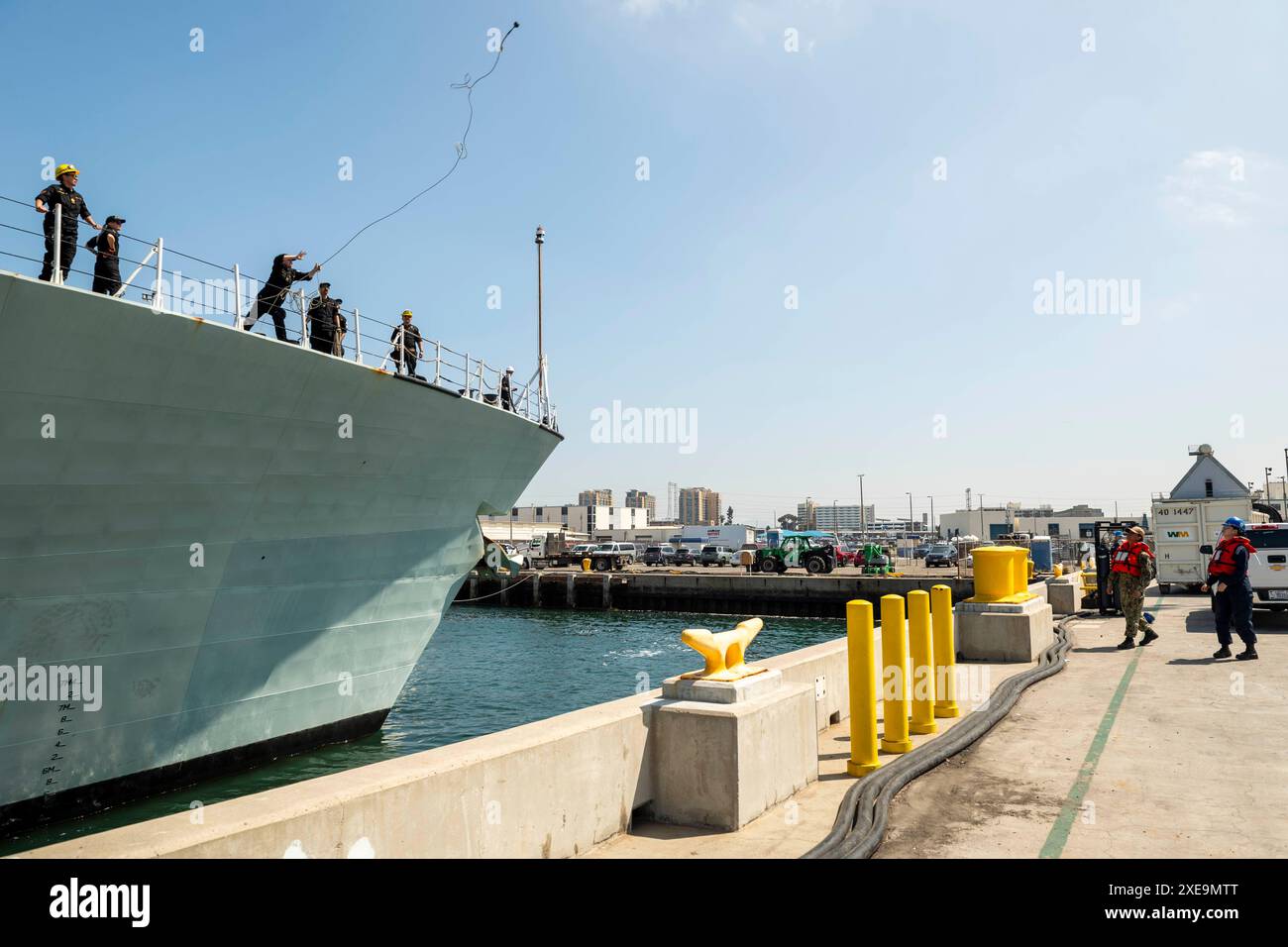 Sailors assigned to amphibious assault ship USS Essex (LHD 2), prepare ...