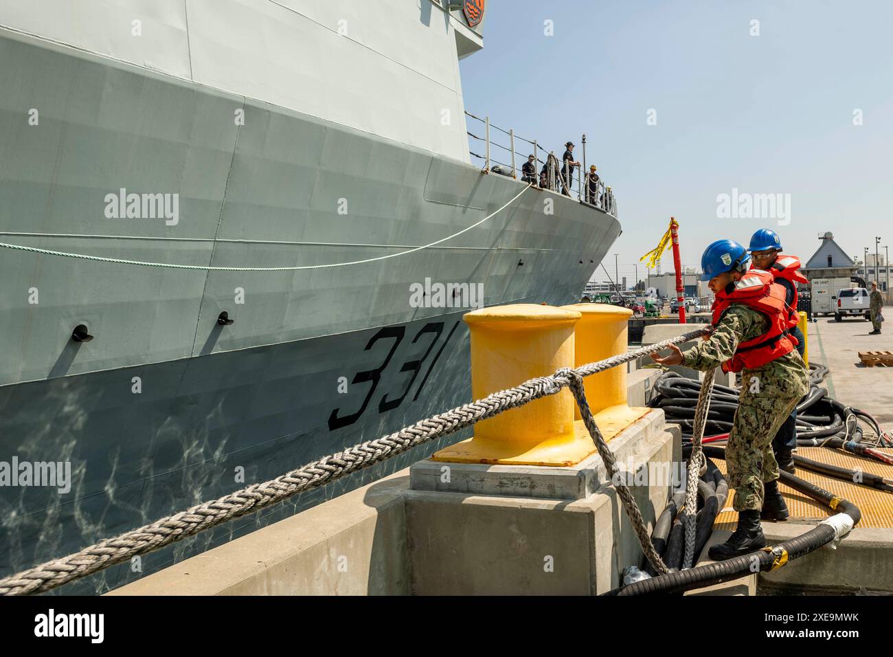 Seaman Jose Jimenezramos, front, and Aviation Ordnanceman Airman Daniel ...