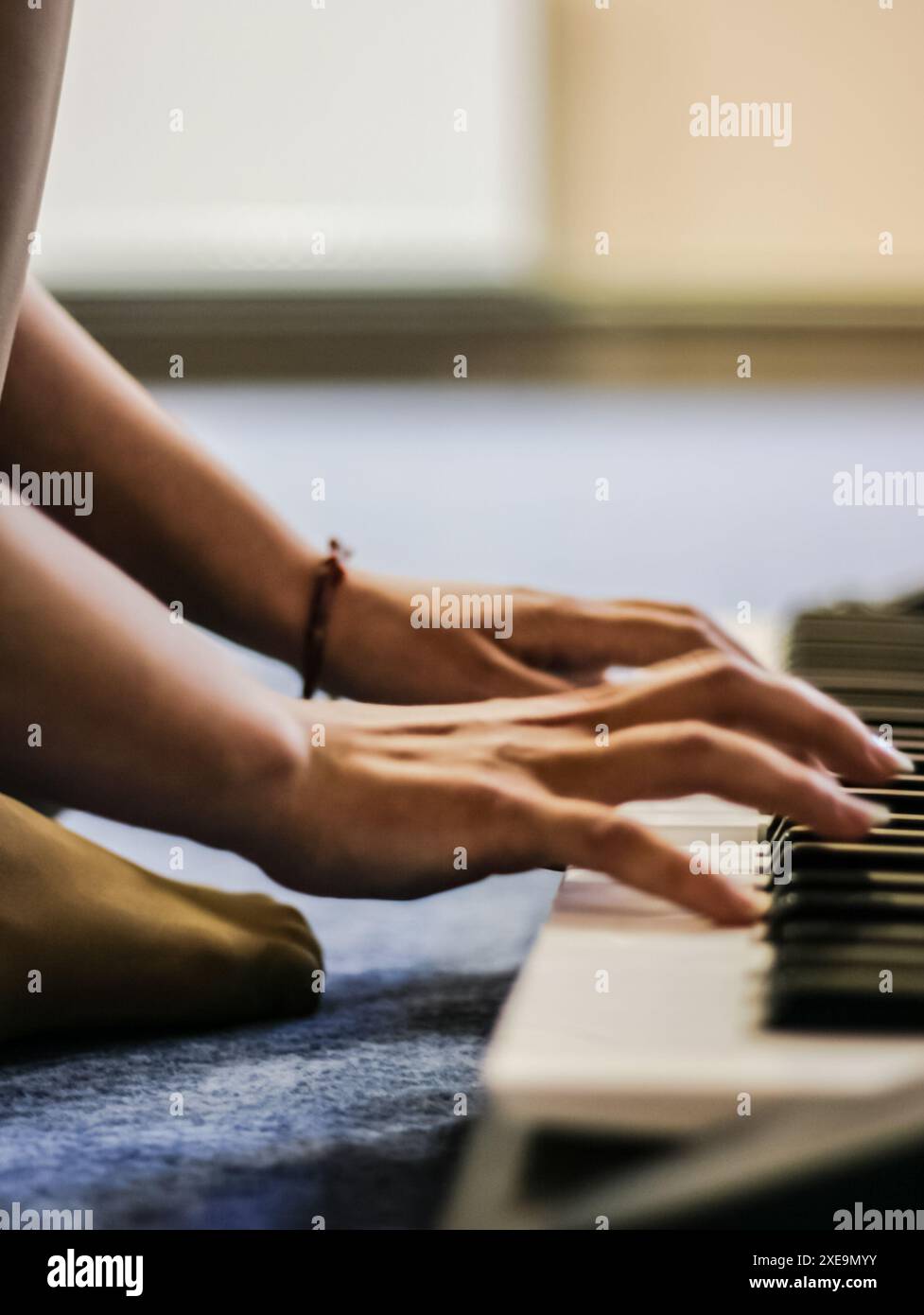 Asian man playing keyboard hi-res stock photography and images - Alamy