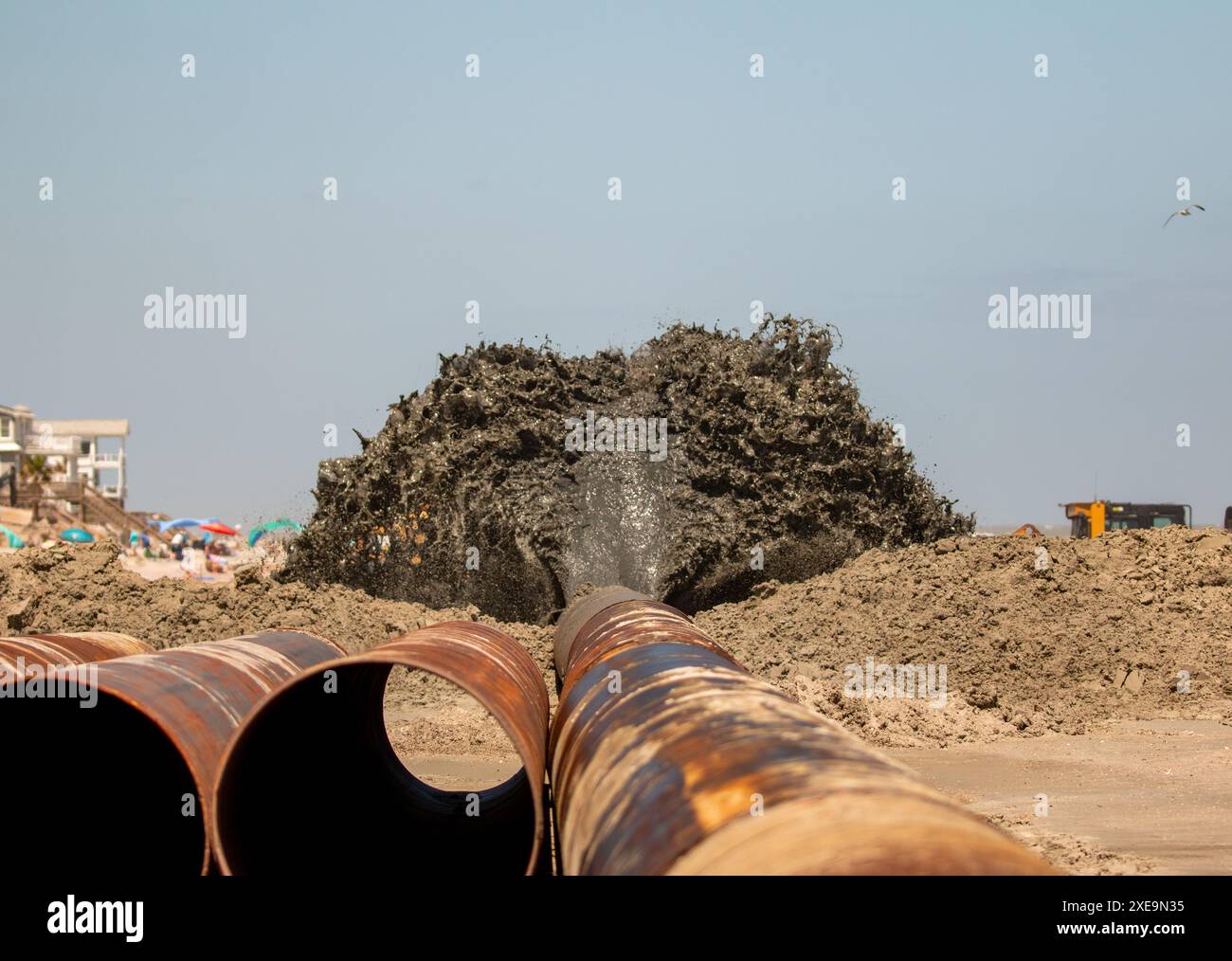 Contractors for the U.S. Army Corps of Engineers Charleston District place material during the ...