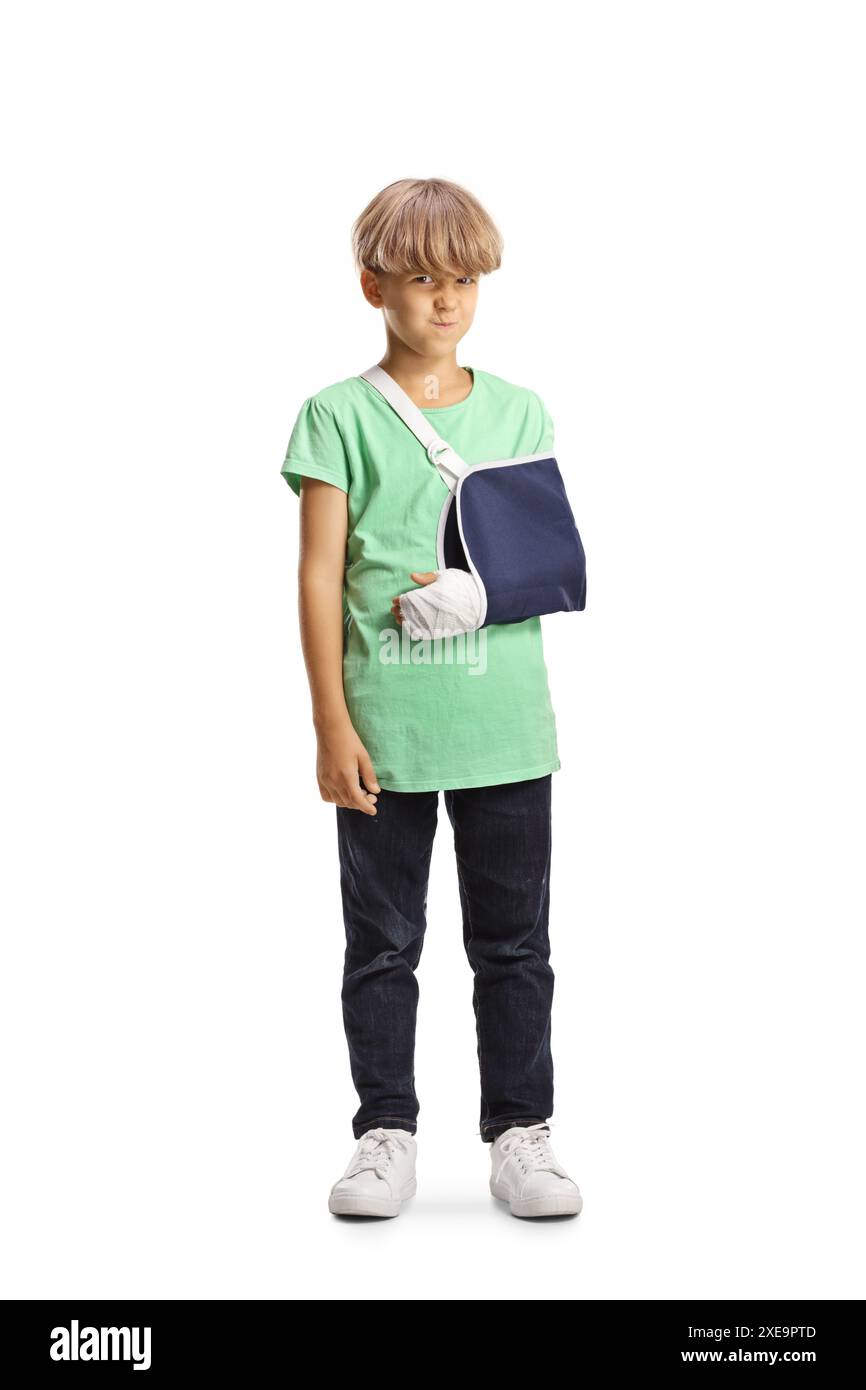 Angry boy with a broken arm wearing an arm splint isolated on white ...