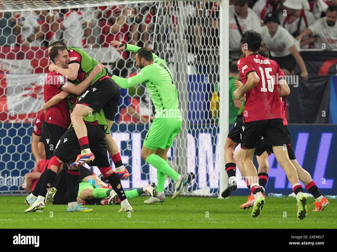 Georgia players celebrate reaching the round of 16 following the UEFA ...