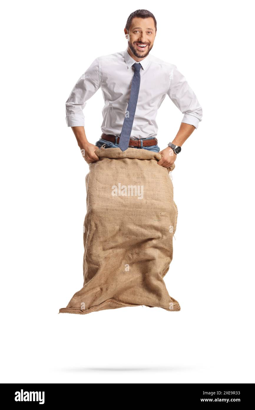 Businessman jumping in a sack playing gunny race isolated on white ...