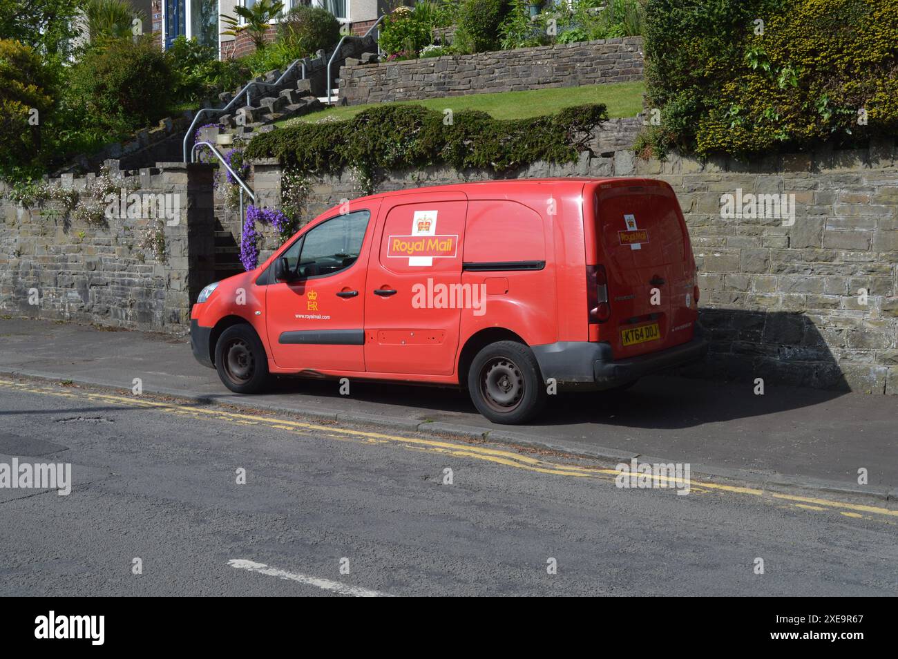 A Royal Mail van parked on a road in Langland. Swansea, Wales, United ...