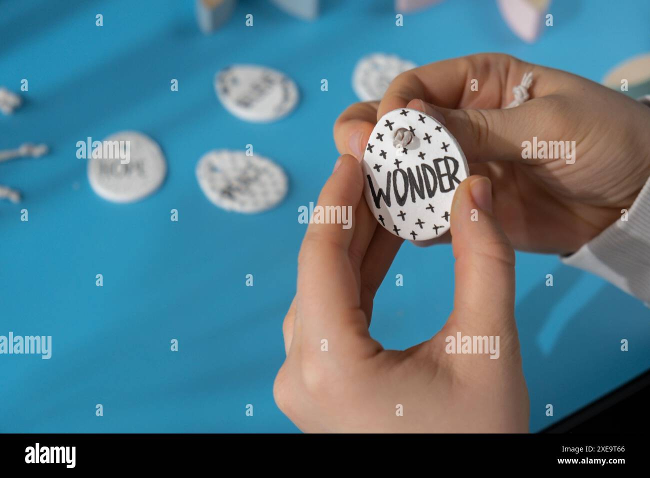 Master class word WONDER on EASTER clay egg Creator is using white air ...
