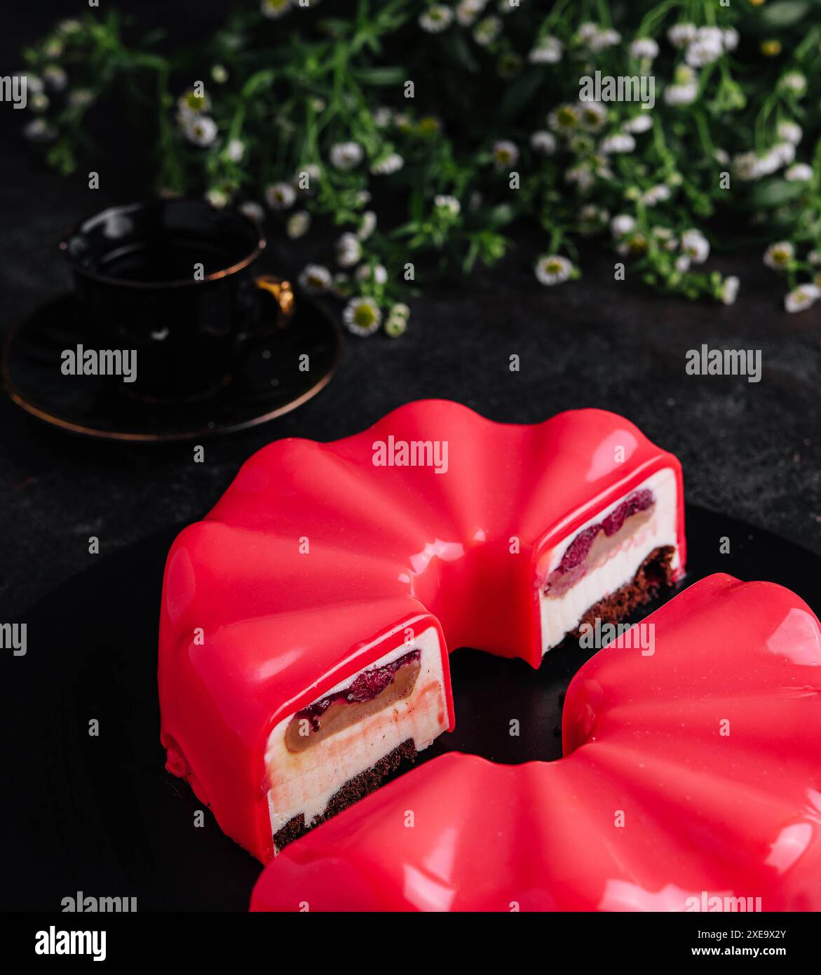 Multi layered raspberry mousse cake on plate Stock Photo - Alamy