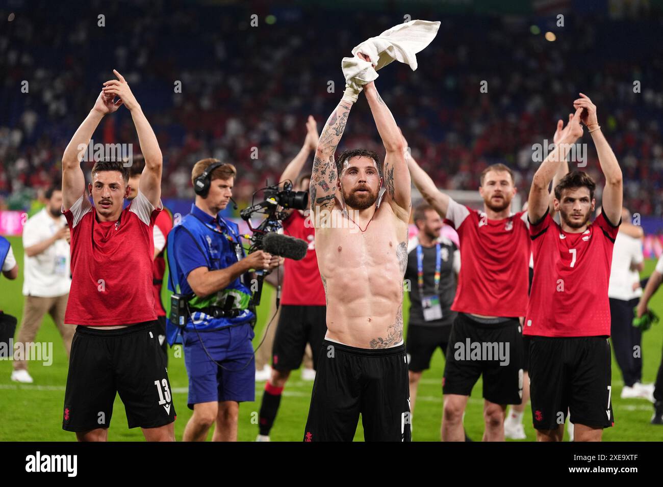 Georgia players celebrate their side’s victory in the UEFA Euro 2024 ...