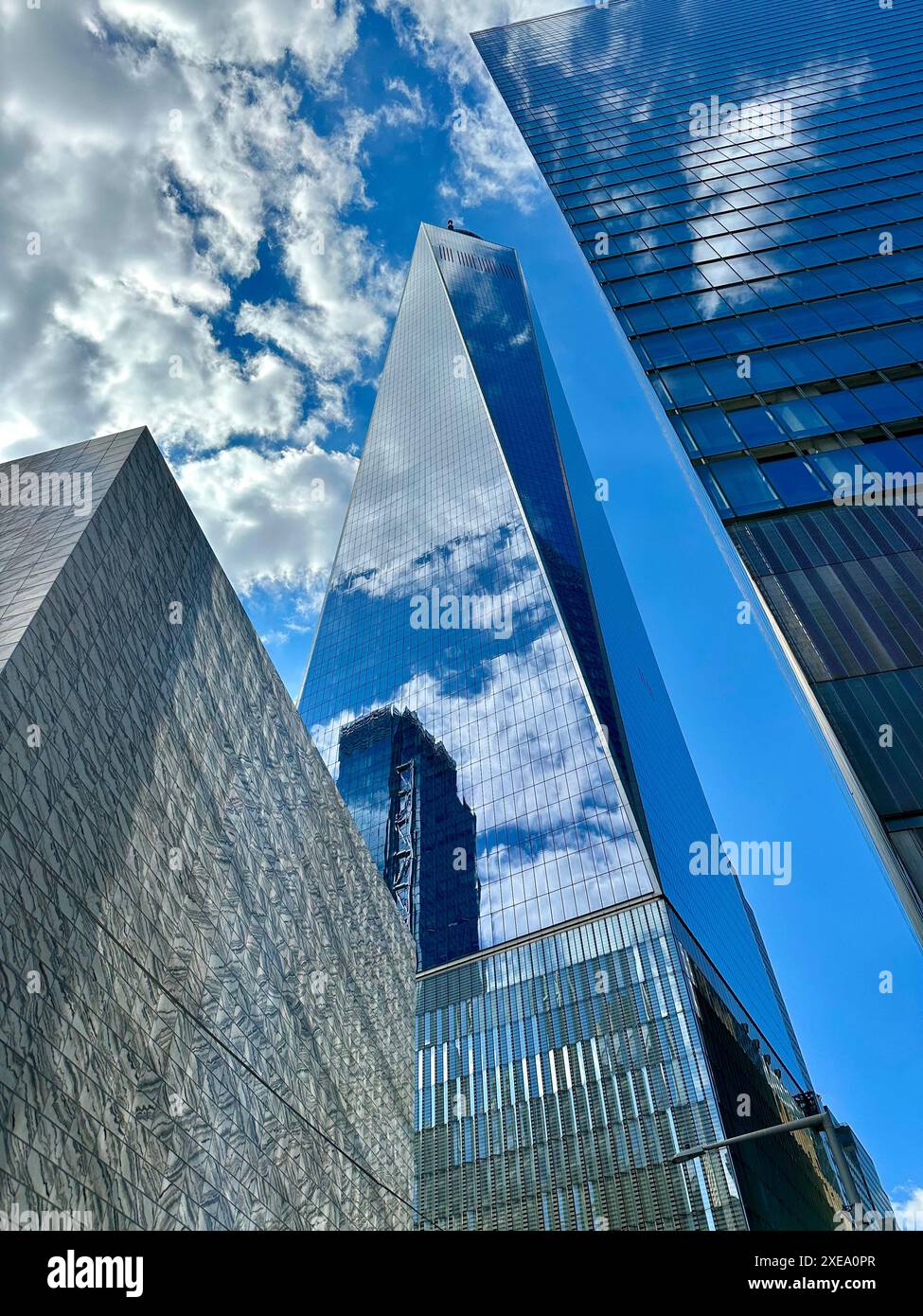 Reflecting New York's sky: The World Trade Center mirrors serene white ...