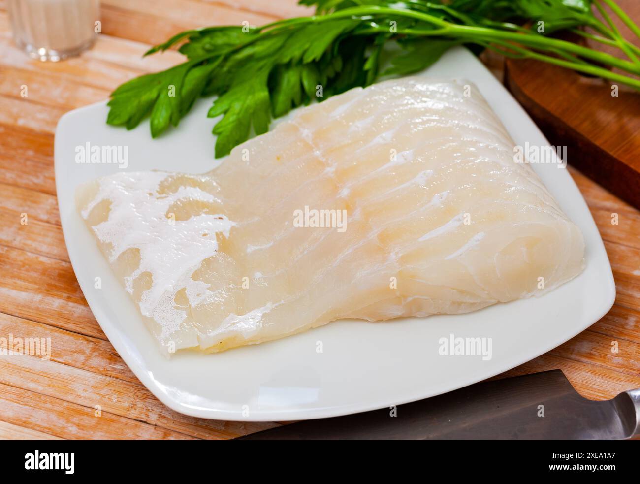 Raw pink cusk-eel fish fillet, seafood ingredients Stock Photo - Alamy