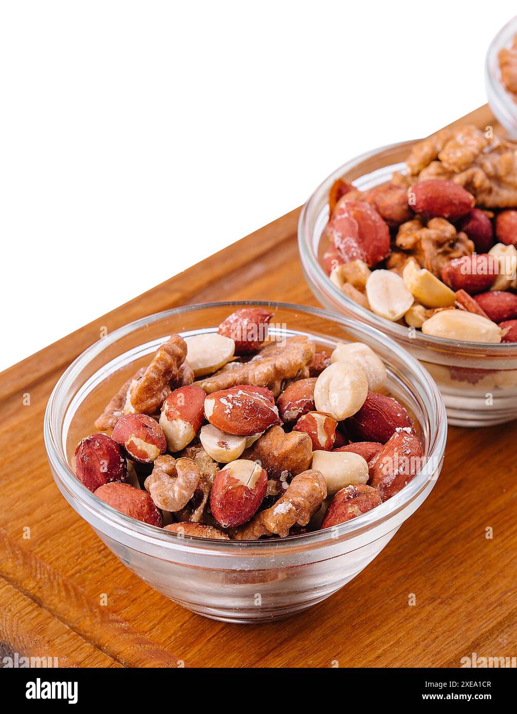 Nuts in white bowls hi-res stock photography and images - Alamy