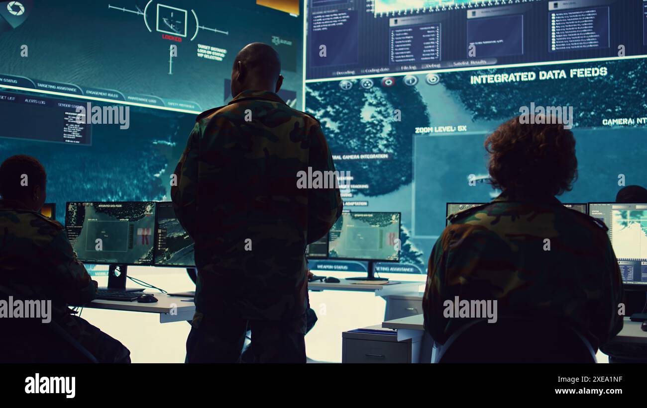 Commander and his crew operating radar systems via CCTV and satellite ...