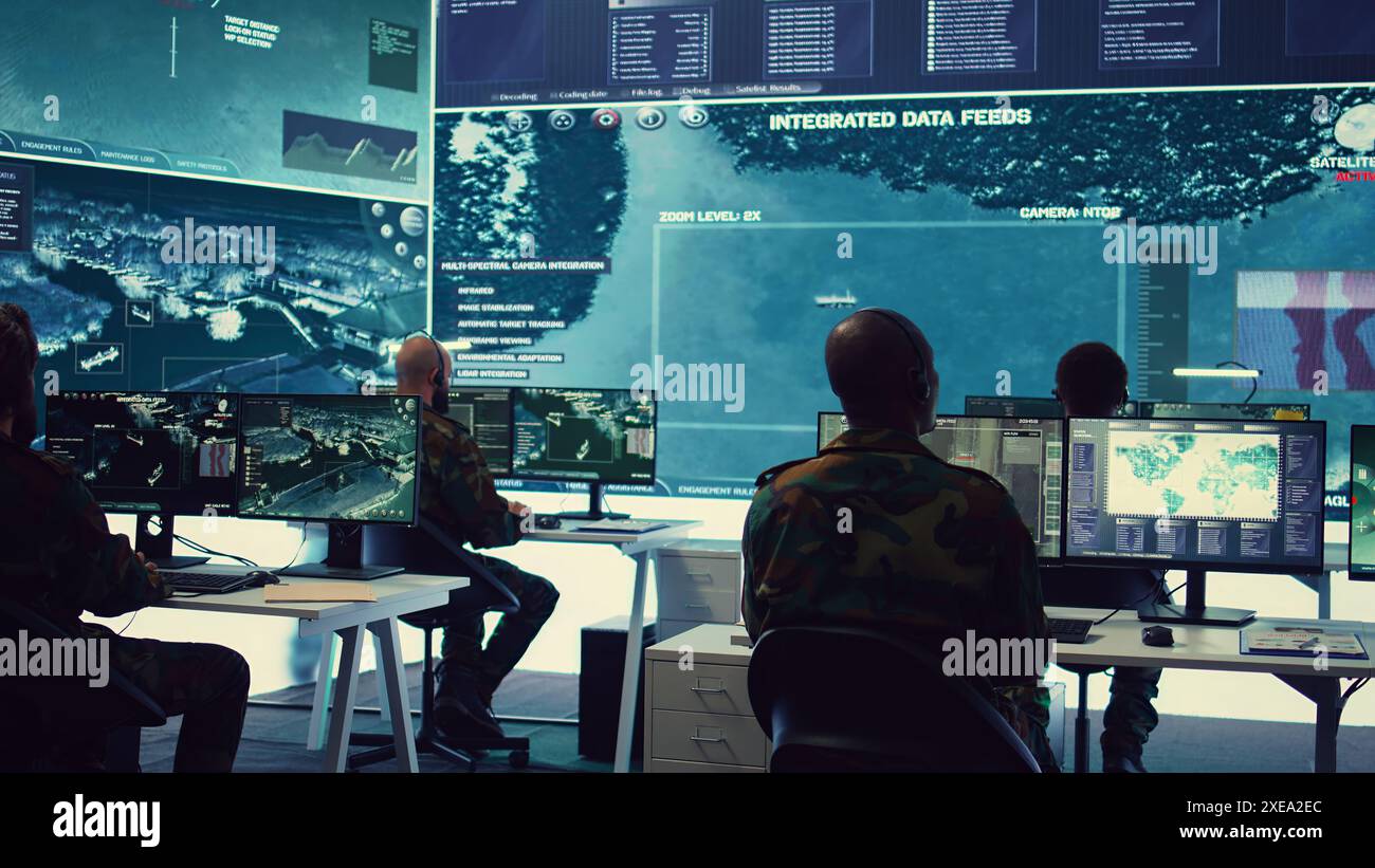 Military crew working in reconnaissance control tower power base ...