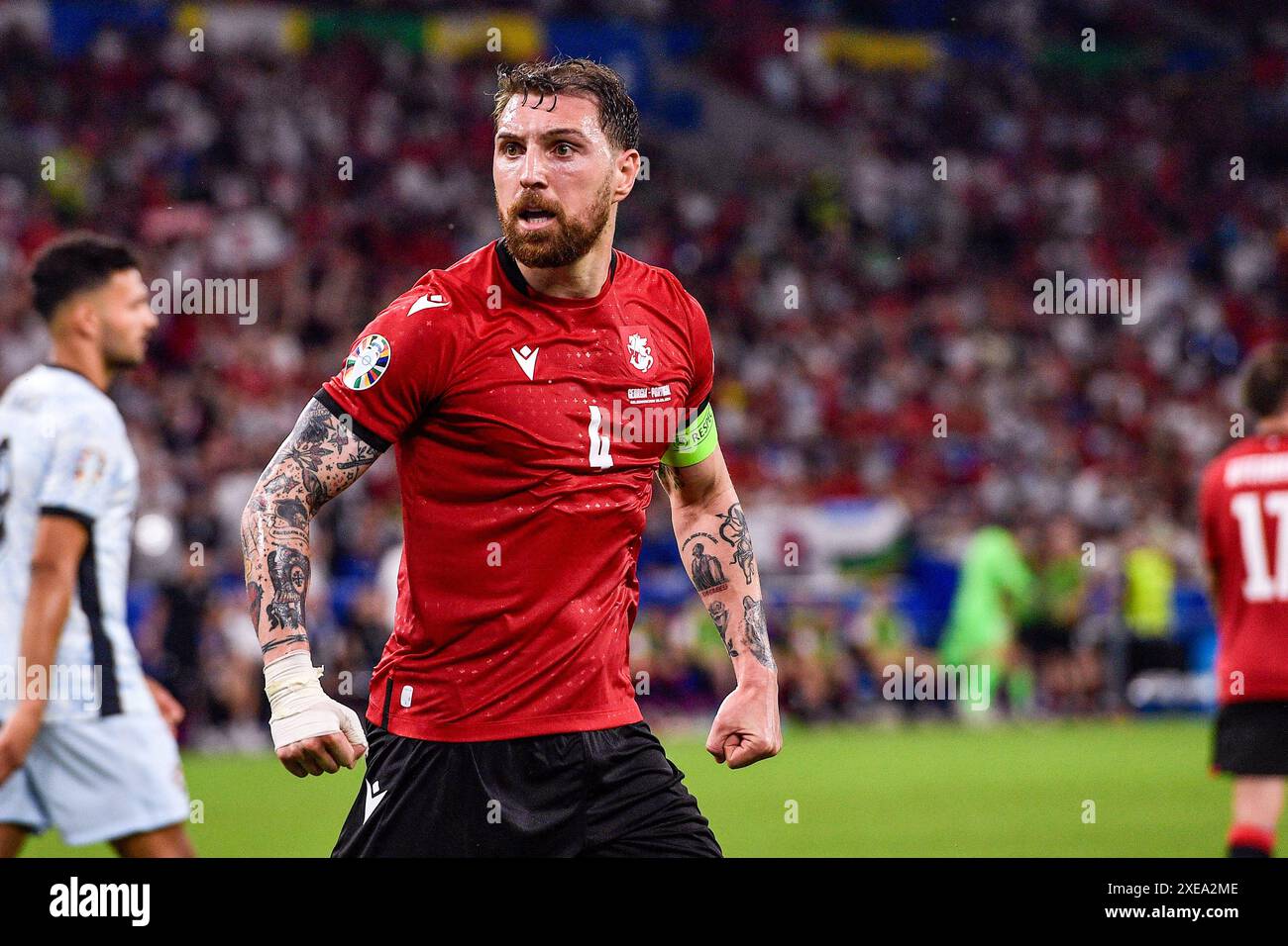 GELSENKIRCHEN, GERMANY - JUNE 26: Guram Kashia of Georgia looks on ...
