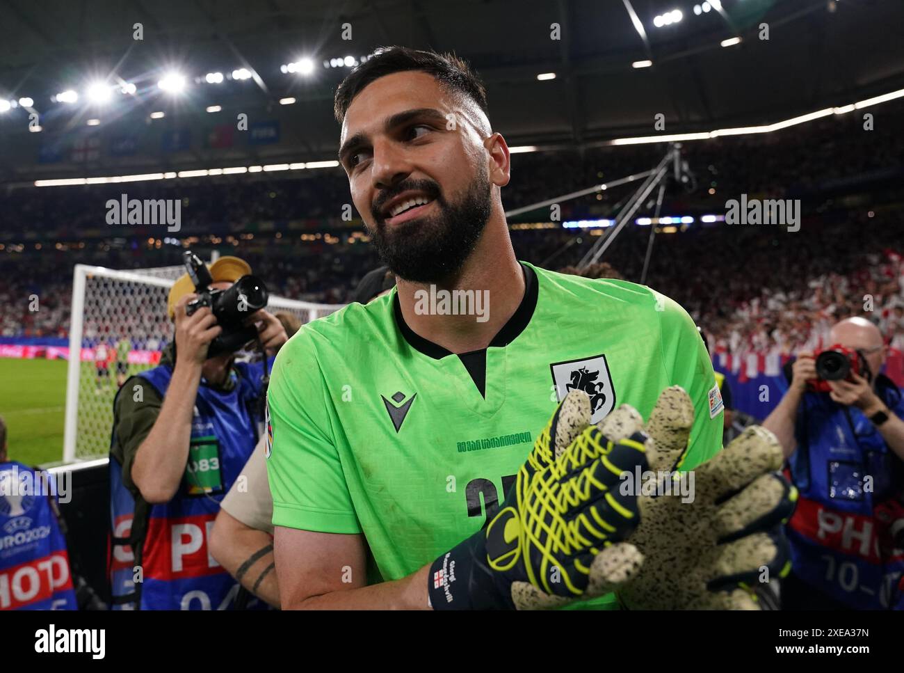 Georgia goalkeeper Giorgi Mamardashvili celebrates their side’s victory ...