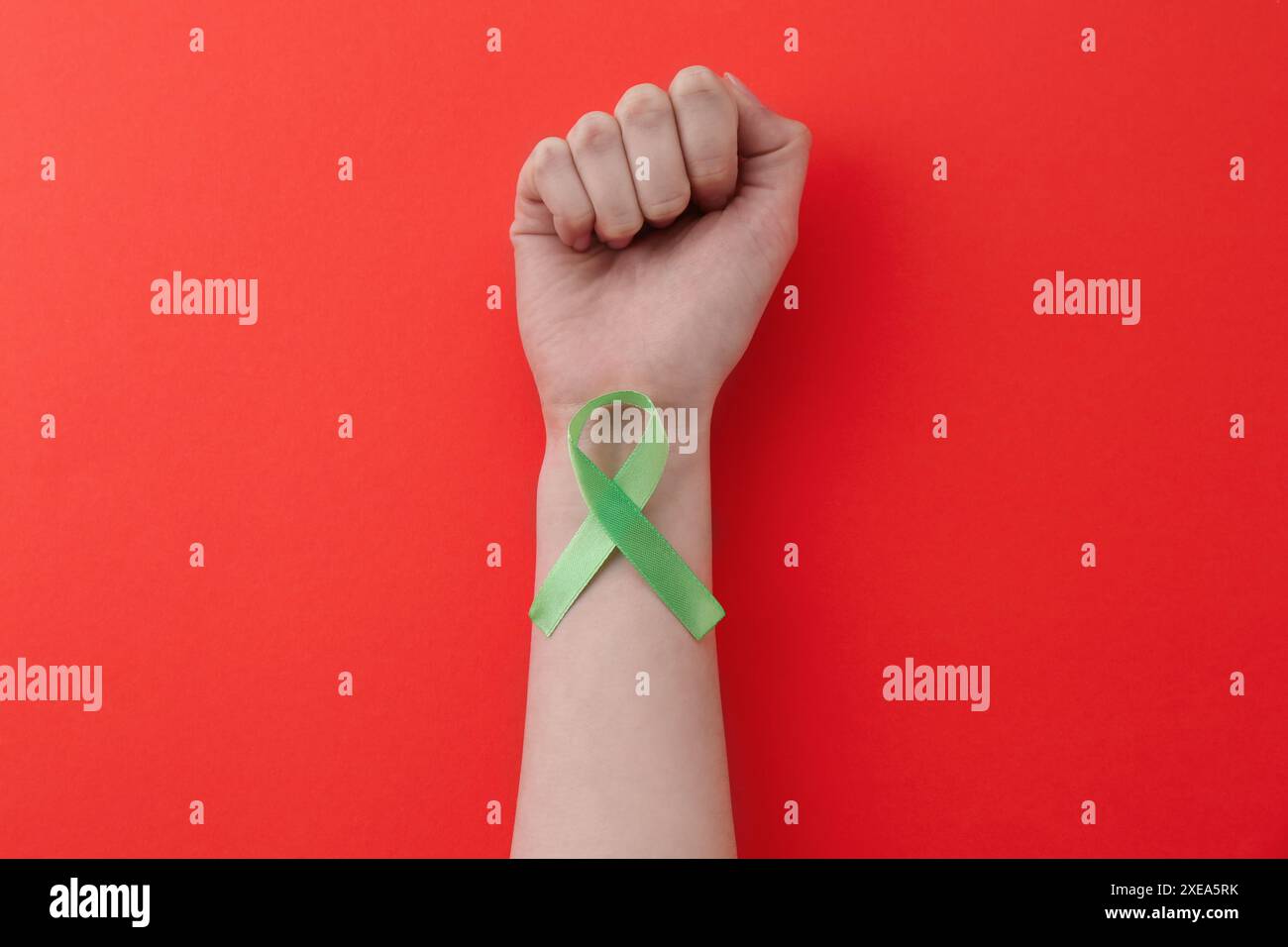 Green awareness ribbon bipolar hi-res stock photography and images - Alamy