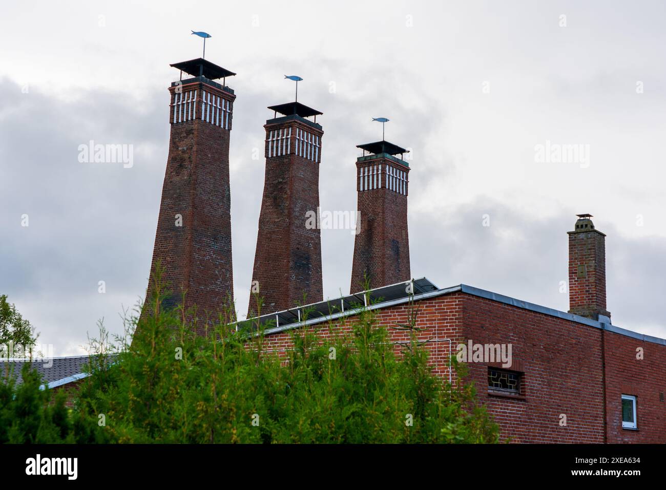 Building with brick chimneys hi-res stock photography and images - Alamy