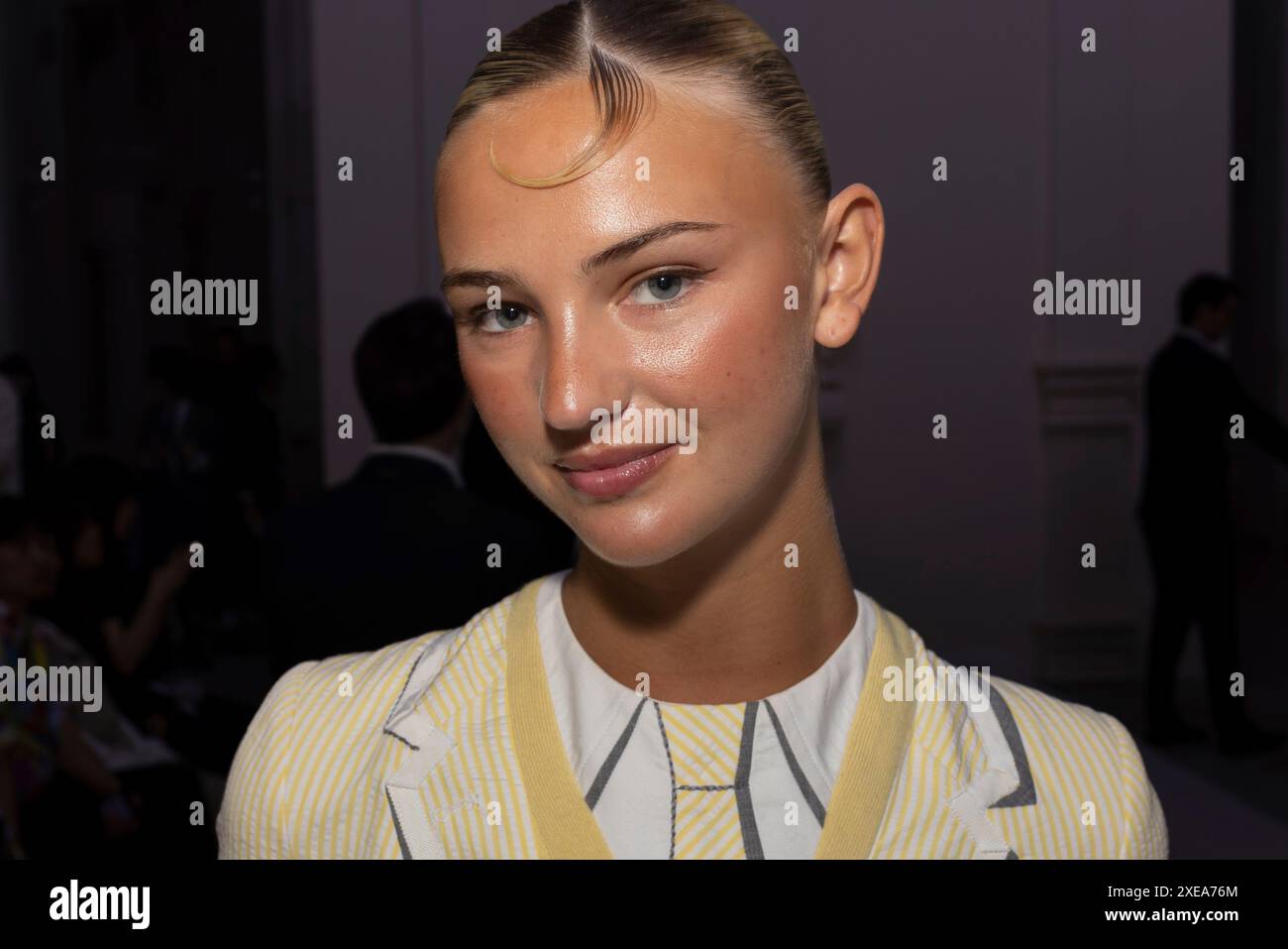 Mia Regan poses for photographers at the Thom Browne Haute Couture Fall ...
