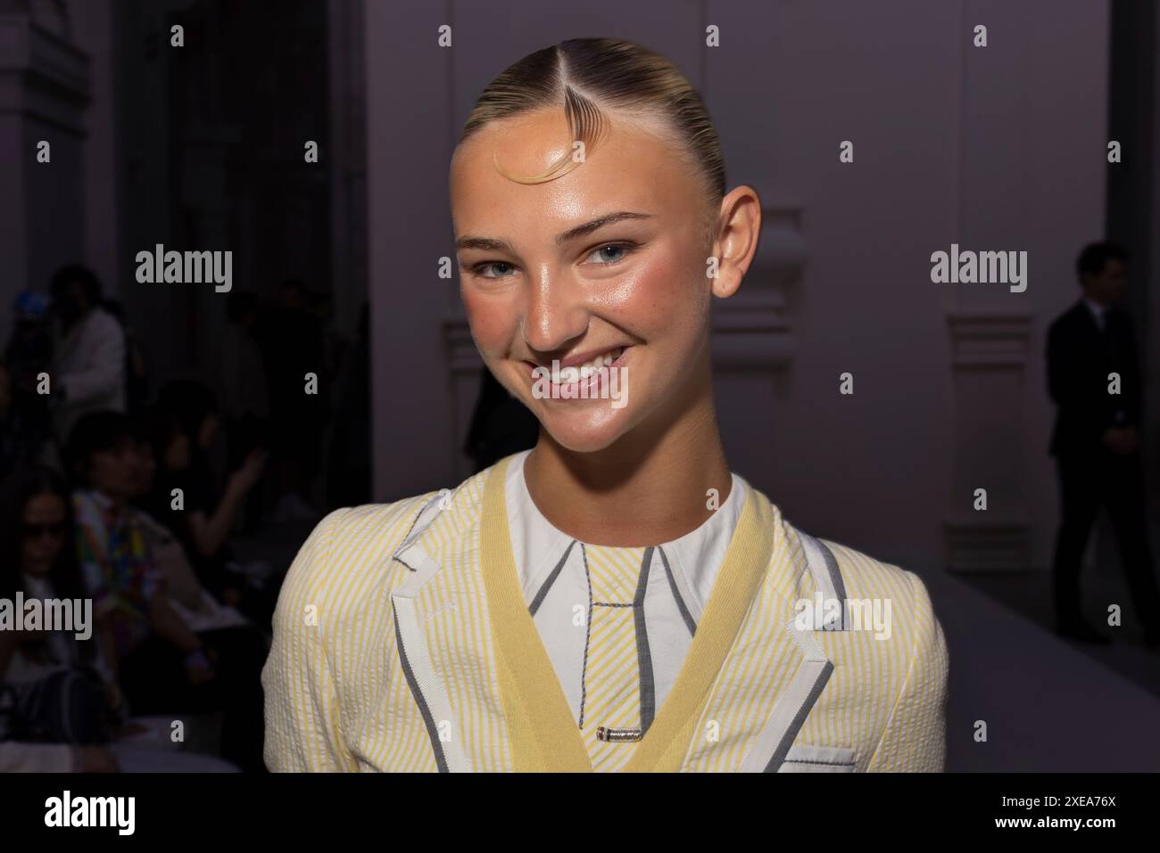 Mia Regan poses for photographers at the Thom Browne Haute Couture Fall ...