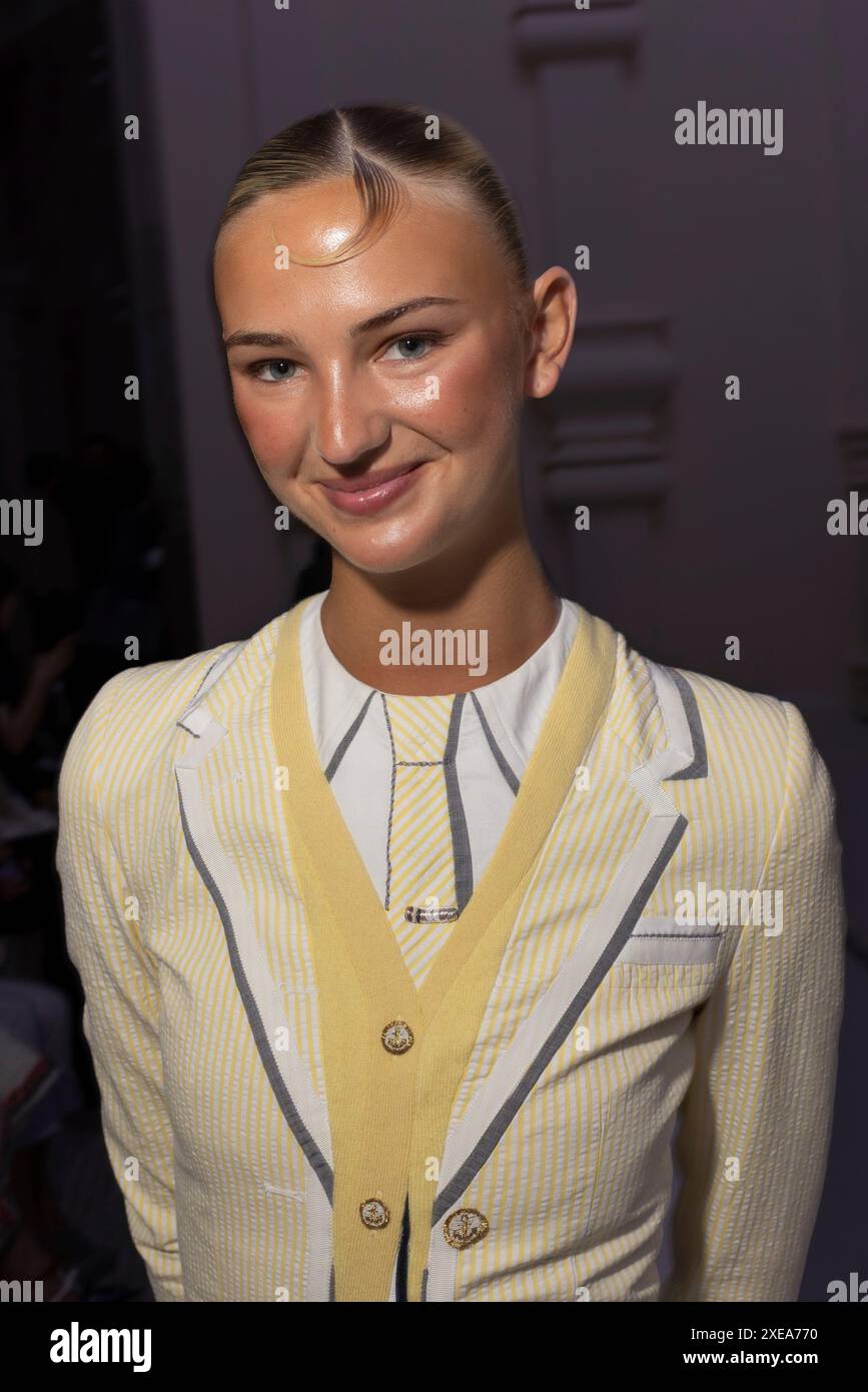 Mia Regan poses for photographers at the Thom Browne Haute Couture Fall ...