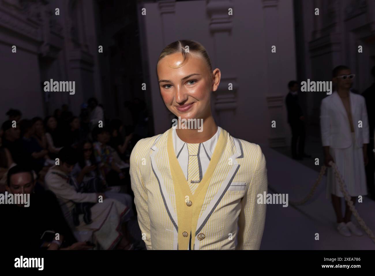 Mia Regan poses for photographers at the Thom Browne Haute Couture Fall ...
