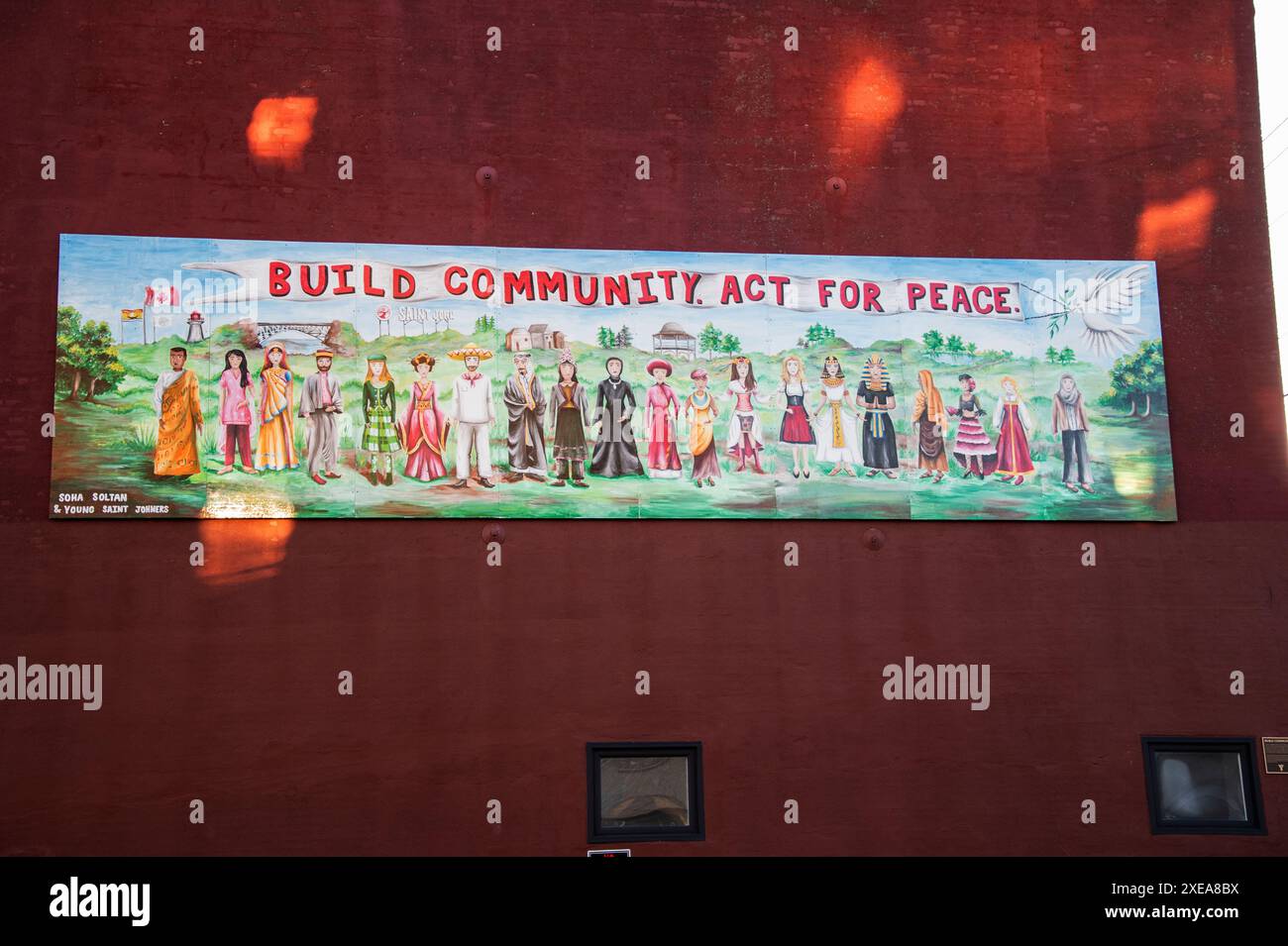 Building community act for peace mural in downtown Saint John, New ...