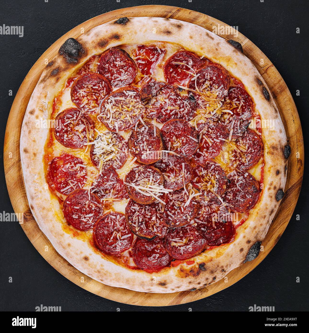 Italian pepperoni pizza on top view Stock Photo - Alamy
