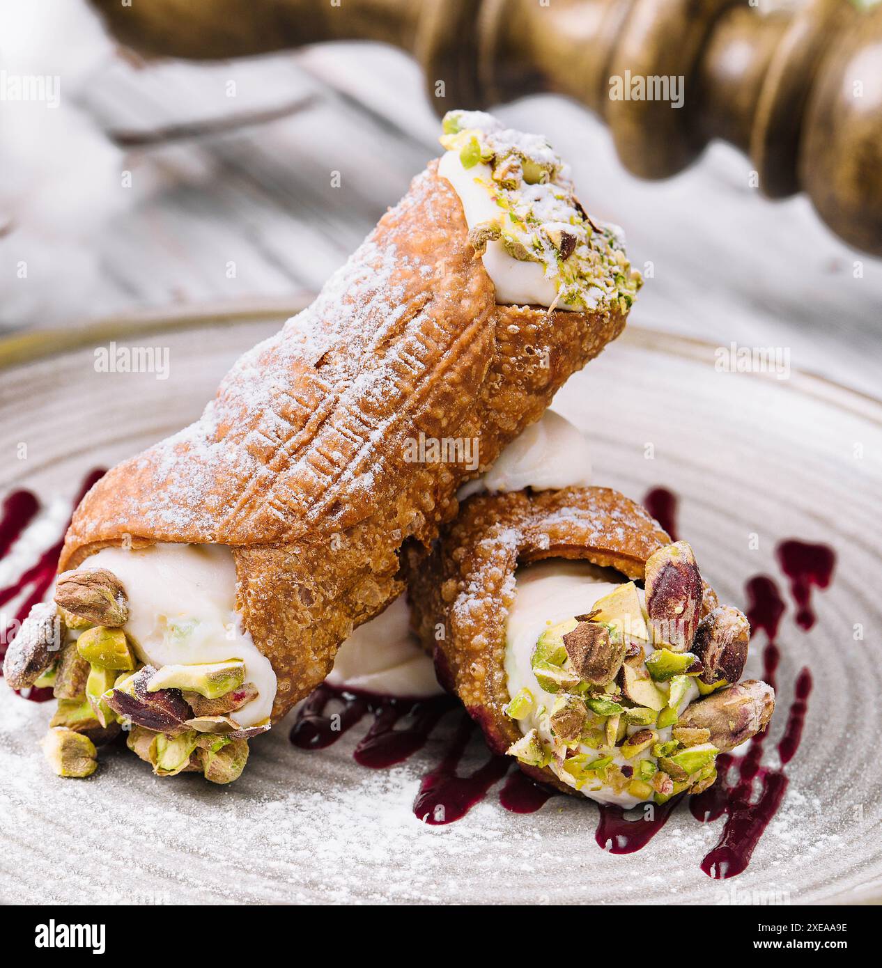 Traditional italian dessert cannoli siciliani on plate Stock Photo - Alamy