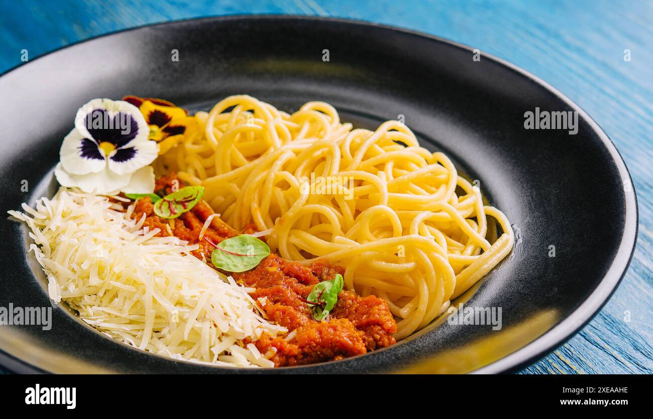Spaghetti bolognese pasta grated cheese hi-res stock photography and ...