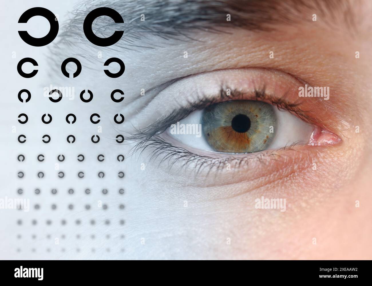 Landolt ring chart and closeup of man's eye. Vision acuity test Stock ...