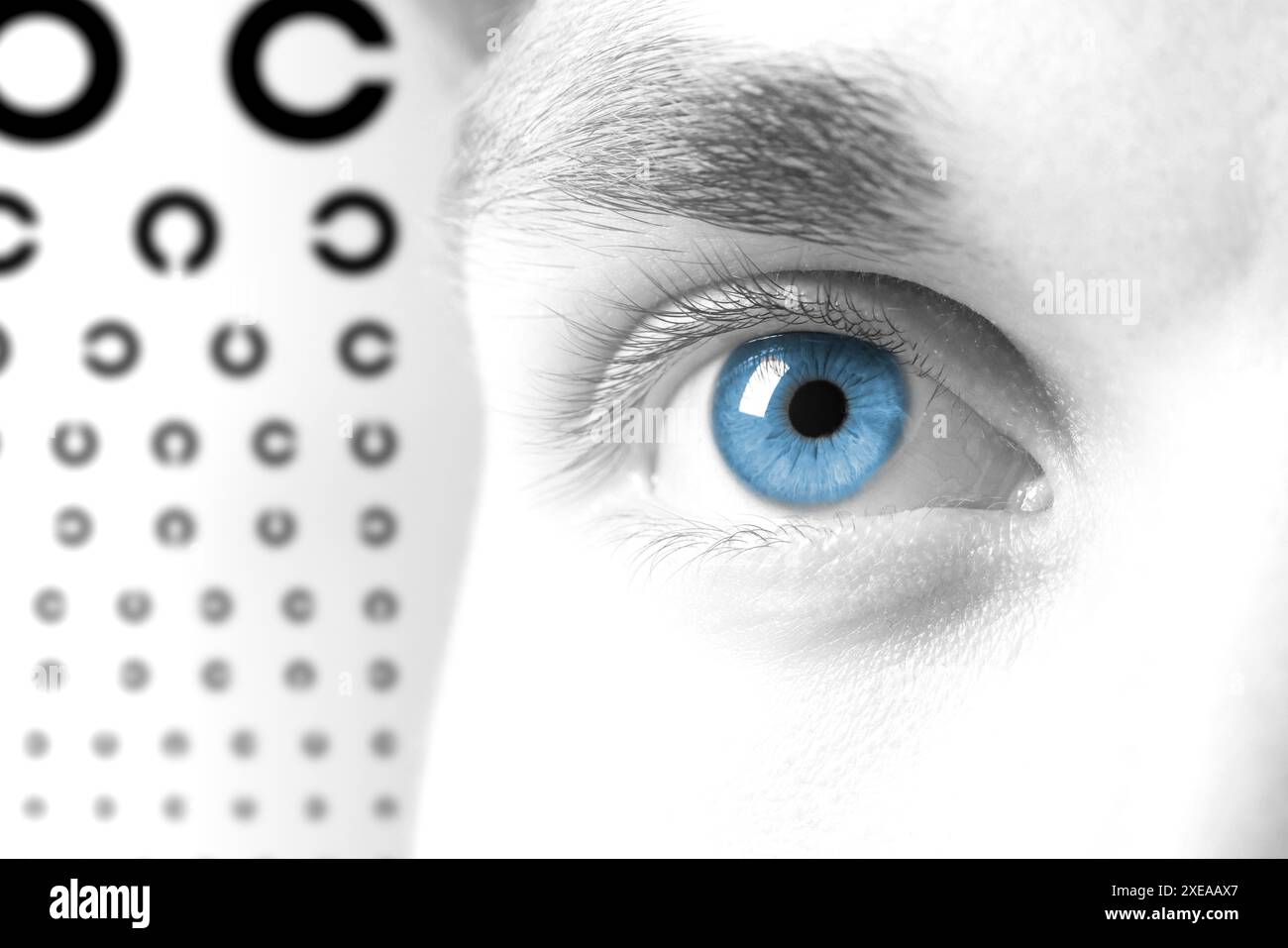 Landolt ring chart and closeup of man's eye on white background. Color ...