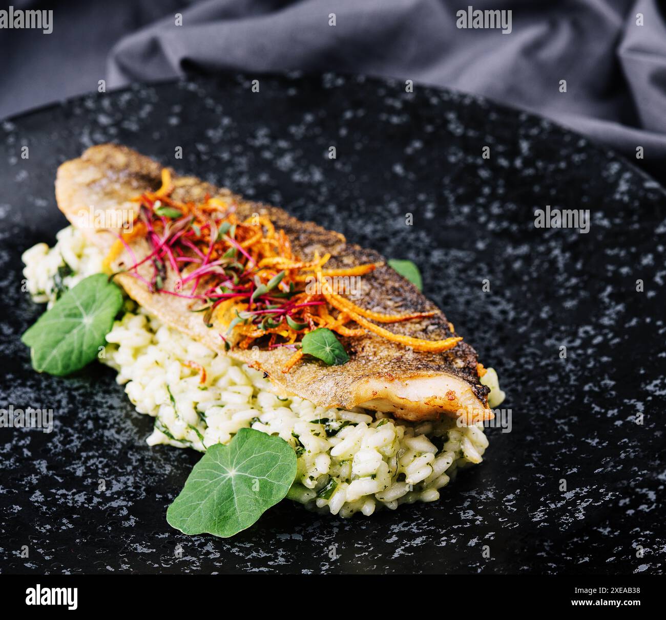 Baked white fish fillet served with steamed rice Stock Photo - Alamy