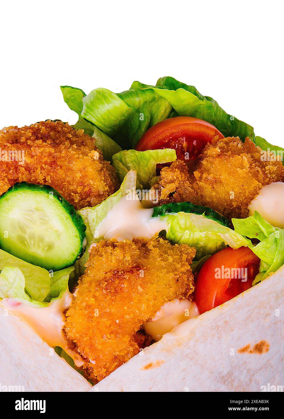 Fried chicken wrap in pita bread with fresh vegetables Stock Photo - Alamy