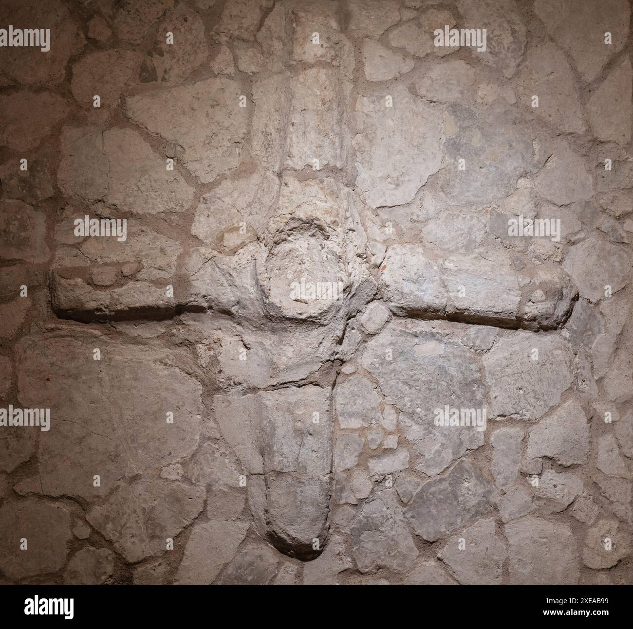 Cross in relief from the cover of Opus signium of a tomb Stock Photo ...