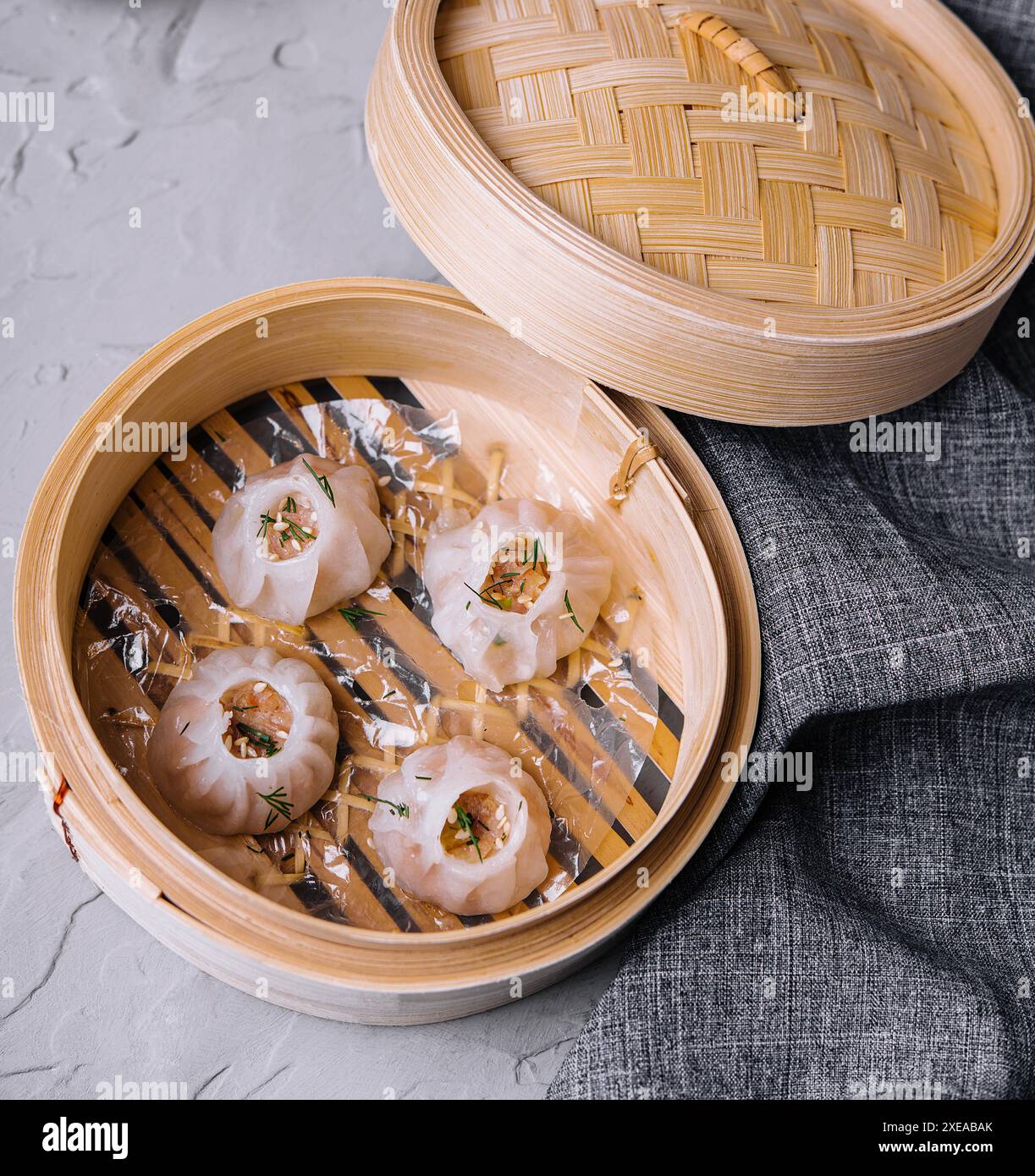 Chinese dumplings being steamed hi-res stock photography and images - Alamy