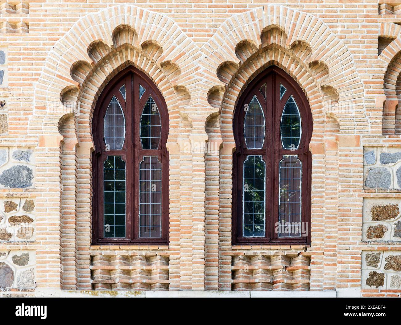Ornate windows in moorish style in Toledo railway station Stock Photo ...