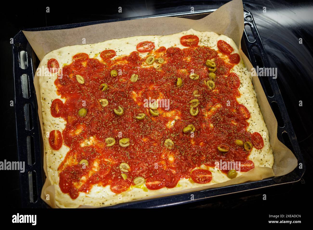 Ready-to-Bake Pizza - An appetizing pre-baked pizza featuring rich ...