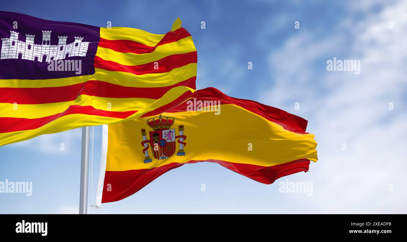 Close-up of the Balearic Islands flag waving in the wind Stock Photo ...