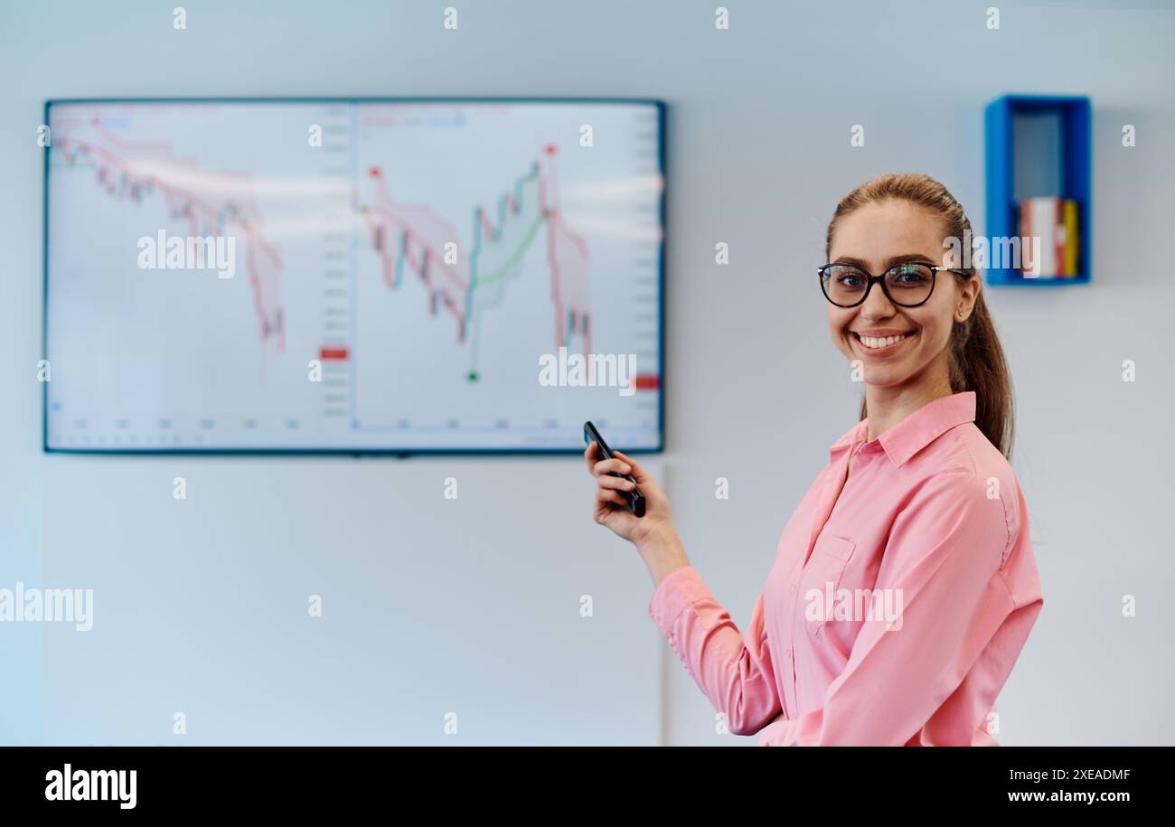 On Stage, Successful Female Speaker Presents Technological Product ...