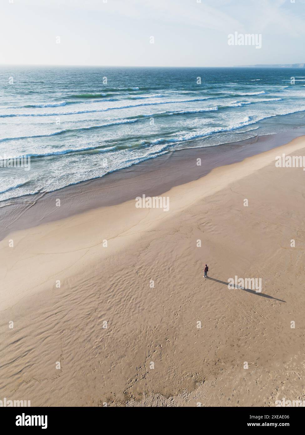 Man standing in ocean waves hi-res stock photography and images - Alamy