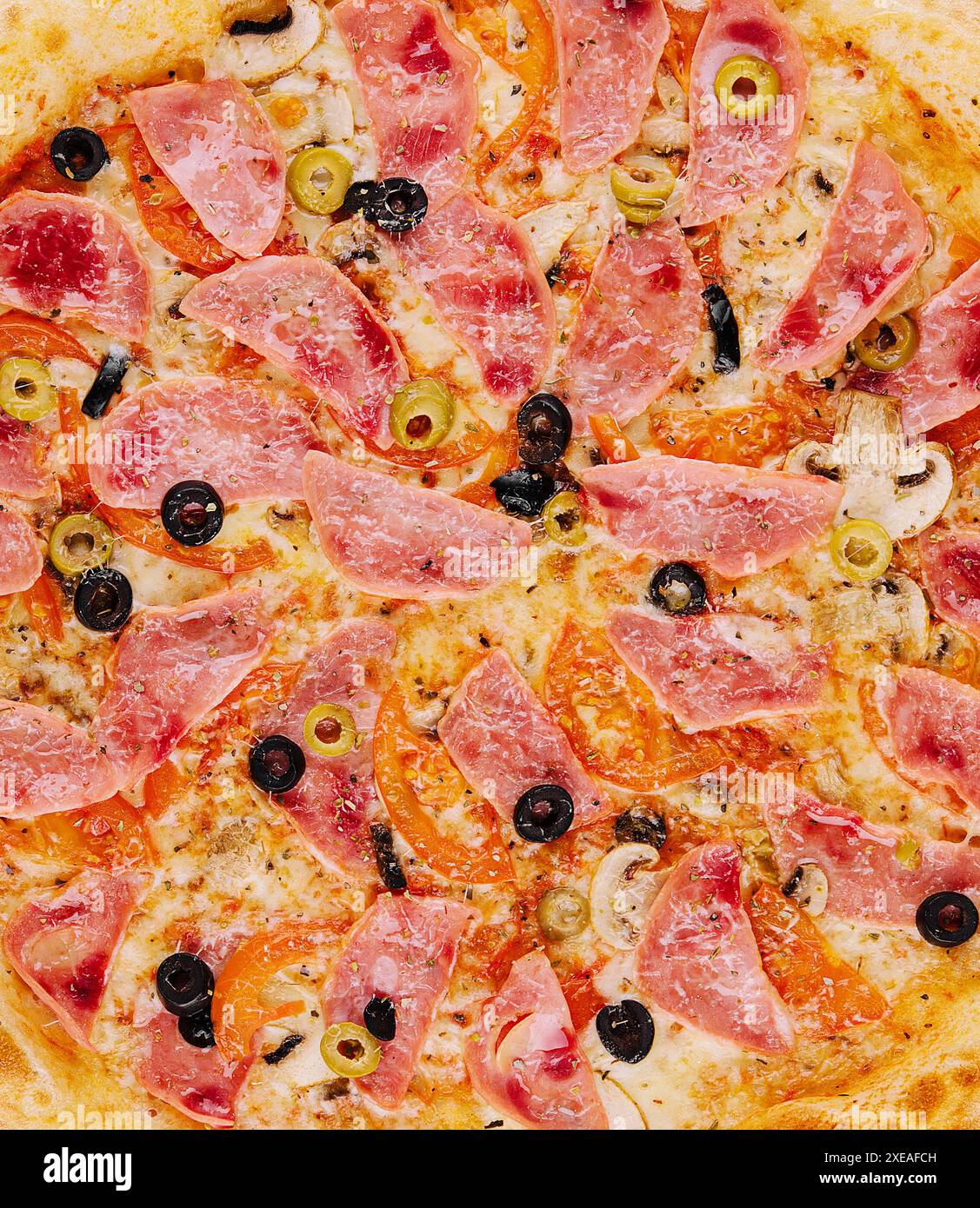 Italian fast food. delicious hot pizza with ham and champignons sliced ...
